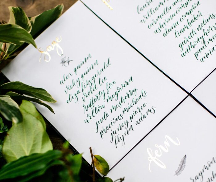 Handwritten calligraphed table plans that make a statement - Stacy ...